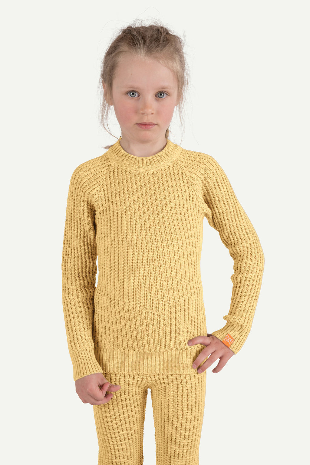 Hustadvika 2.0 Ullgenser Barn, Smørblomst – Lanullva